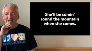 Singalong Favorite: “She’ll Be Comin’ Round the Mountain” | Songs & Smiles